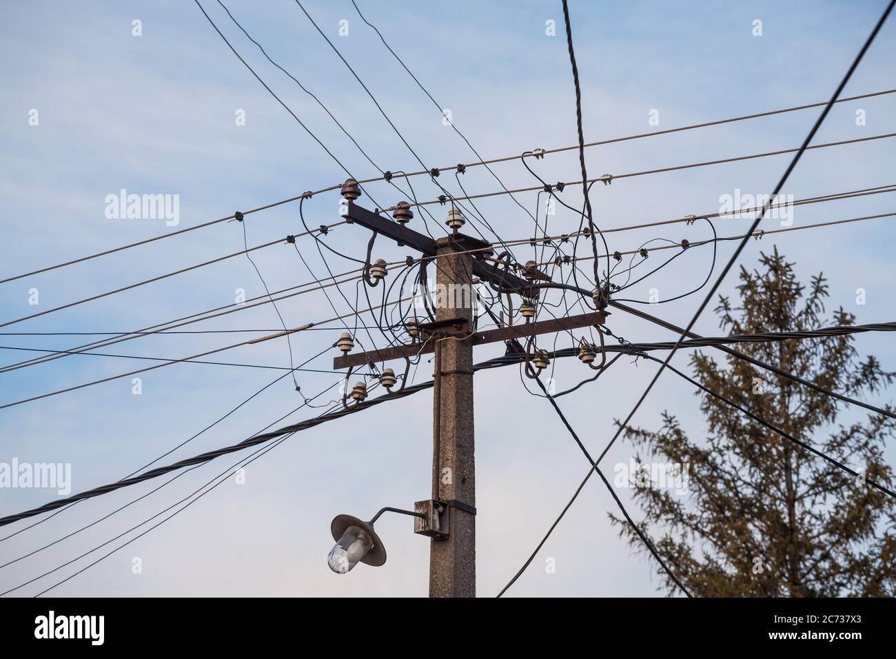 Old power electric line and a Street Lamp, with a power supply cable ...