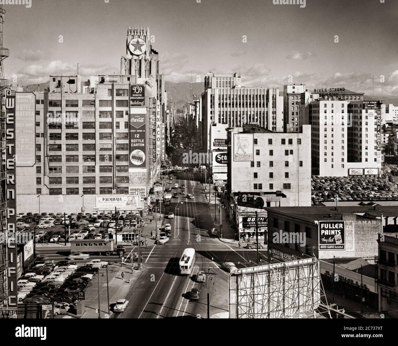 1950s DOWNTOWN AERIAL VIEW OF BROADWAY LOOKING NORTH FROM 9TH STREET ...