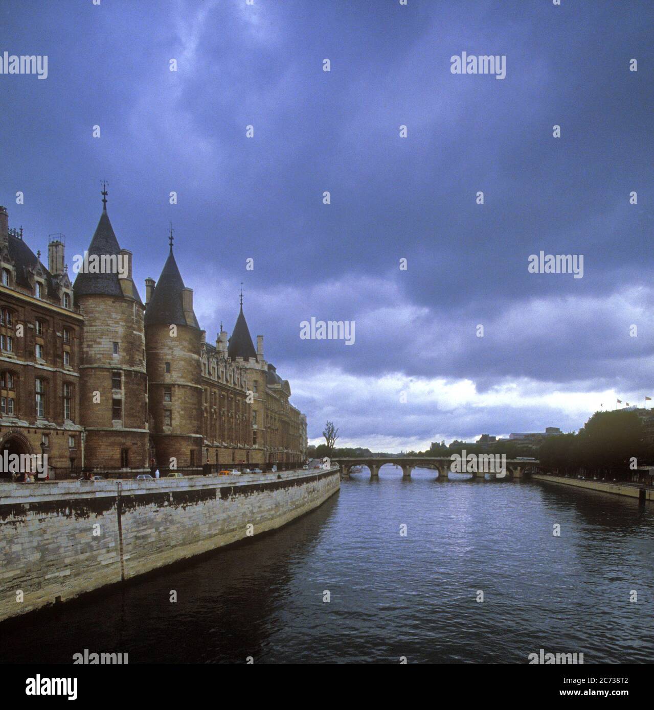 Paris Supreme Court Cour over Seine river. Castle Conciergerie a former ...