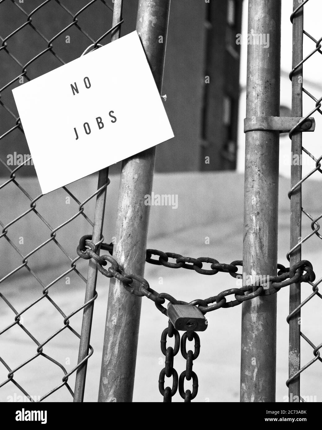 Padlocked gate Black and White Stock Photos & Images - Alamy