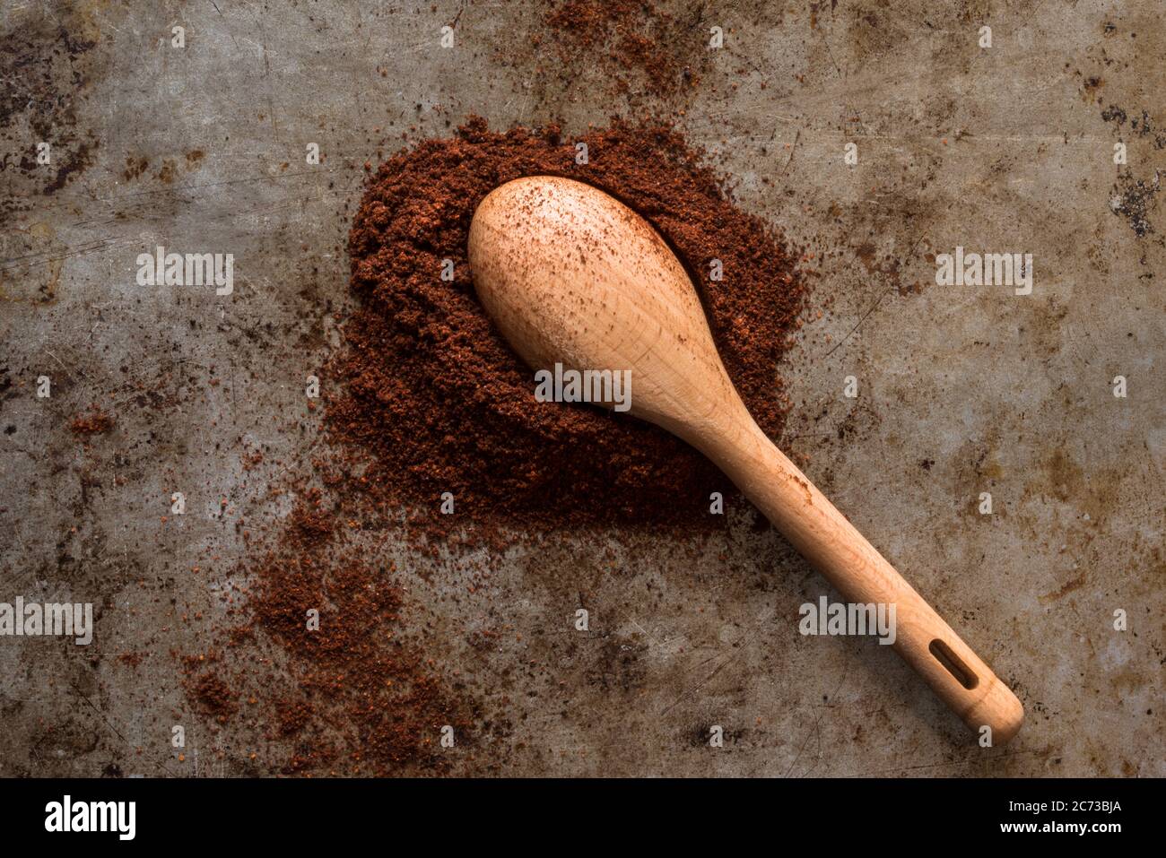 Chili Powder Spilled from a teaspoon Stock Photo - Alamy