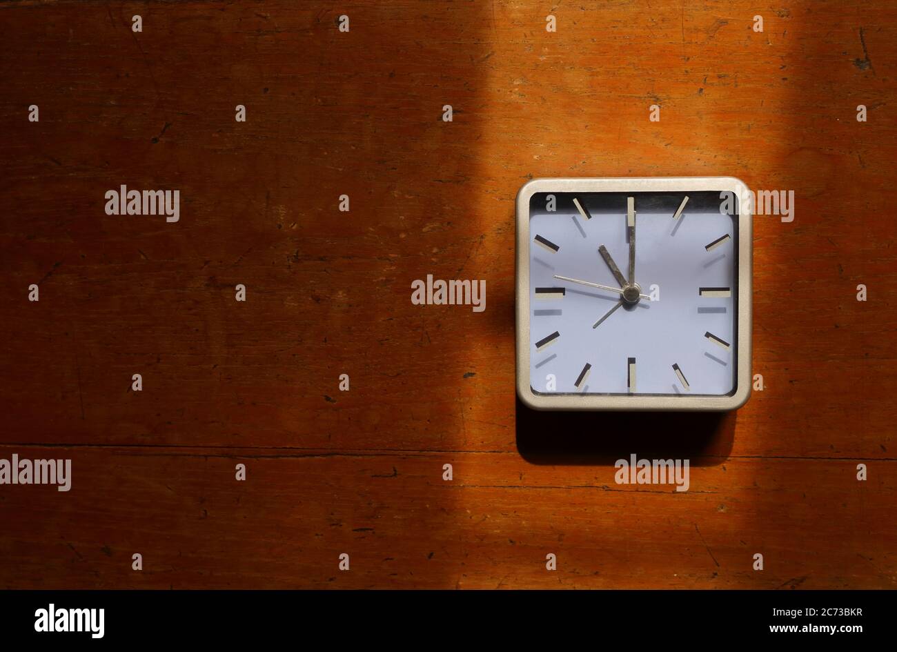 Closeup and selective focus on clock hands at eleven, the eleventh hour ...