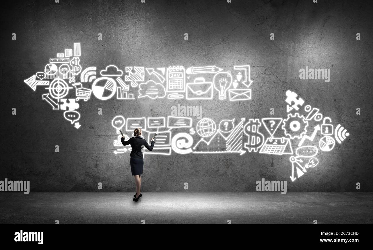 Woman throwing light on her ideas Stock Photo - Alamy