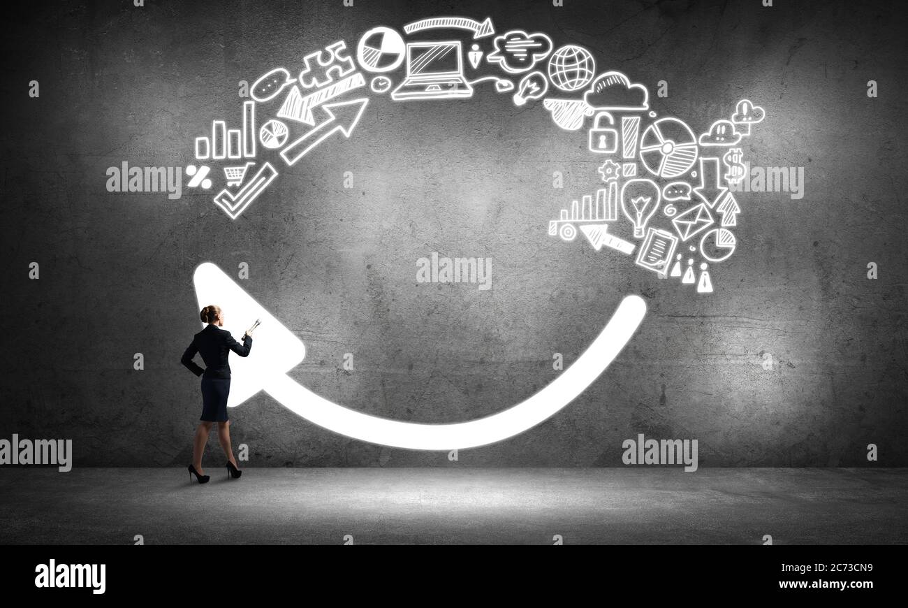 Woman throwing light on her ideas Stock Photo - Alamy