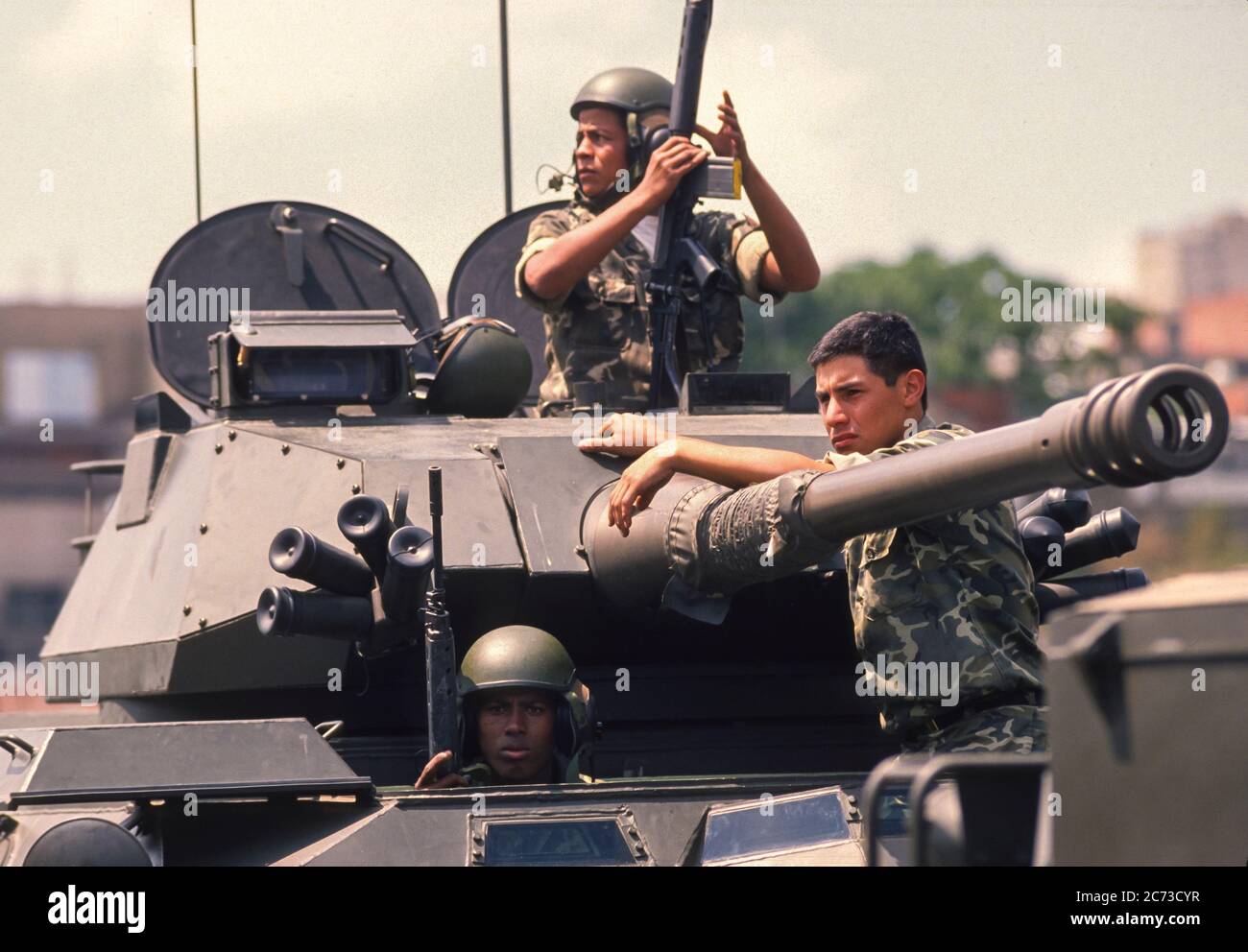 CARACAS, VENEZUELA, MARCH1989 - Soldiers in armored vehicle tank on ...