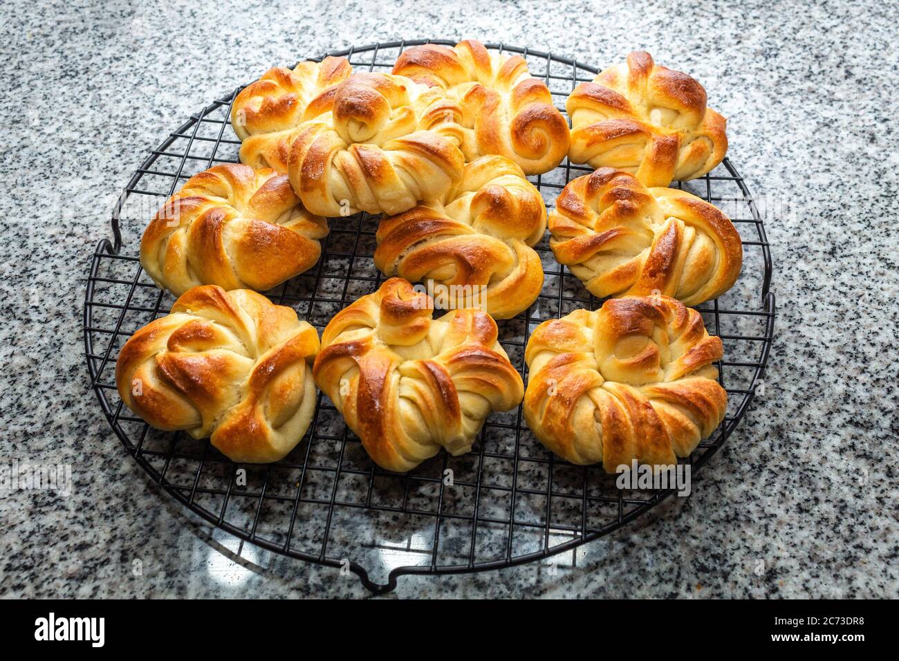 Delicious golden bread fresh from the oven on a counter Stock Photo - Alamy