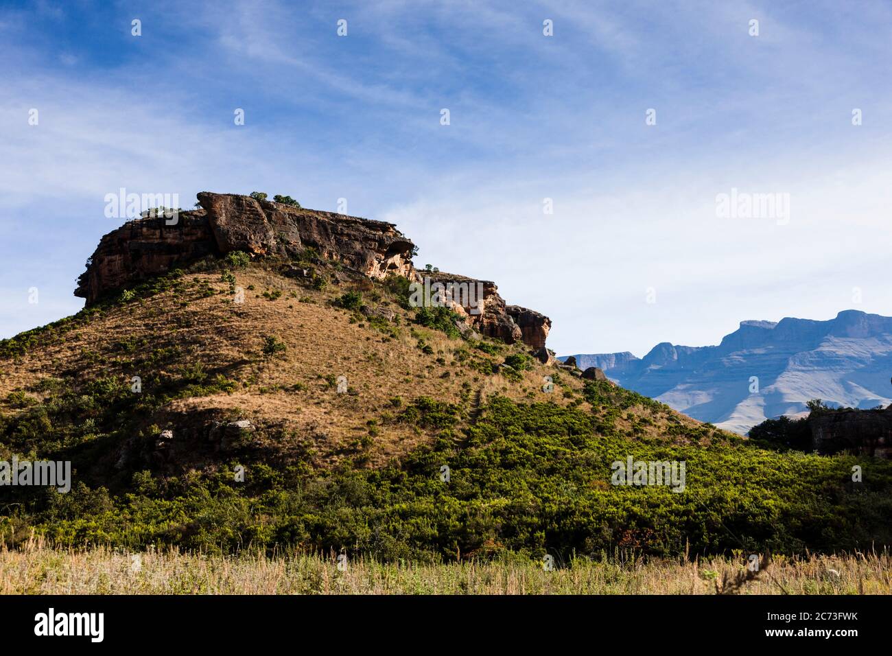 Drakensberg, distant view of "Main cave" rock art site, Giants Castle ...