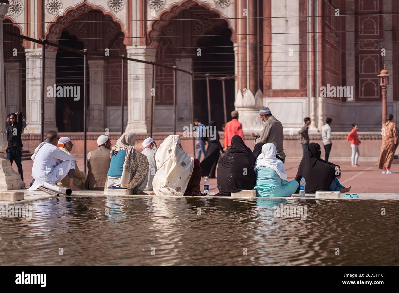 New Delhi / India - February 19, 2020: Muslim believers and tourists in ...