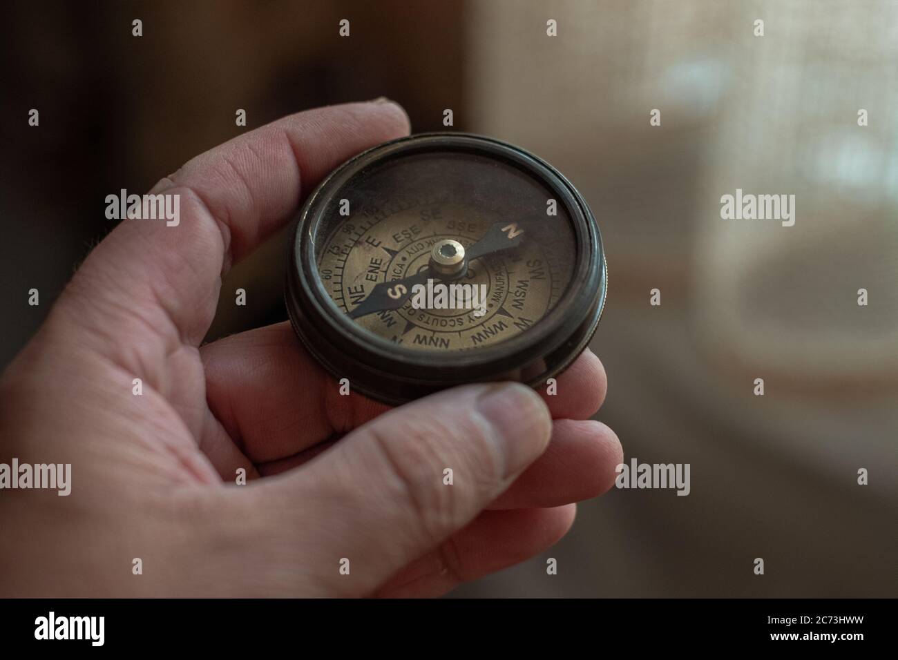 Close-Up Of Hand Holding Navigational Compass Stock Photo - Alamy