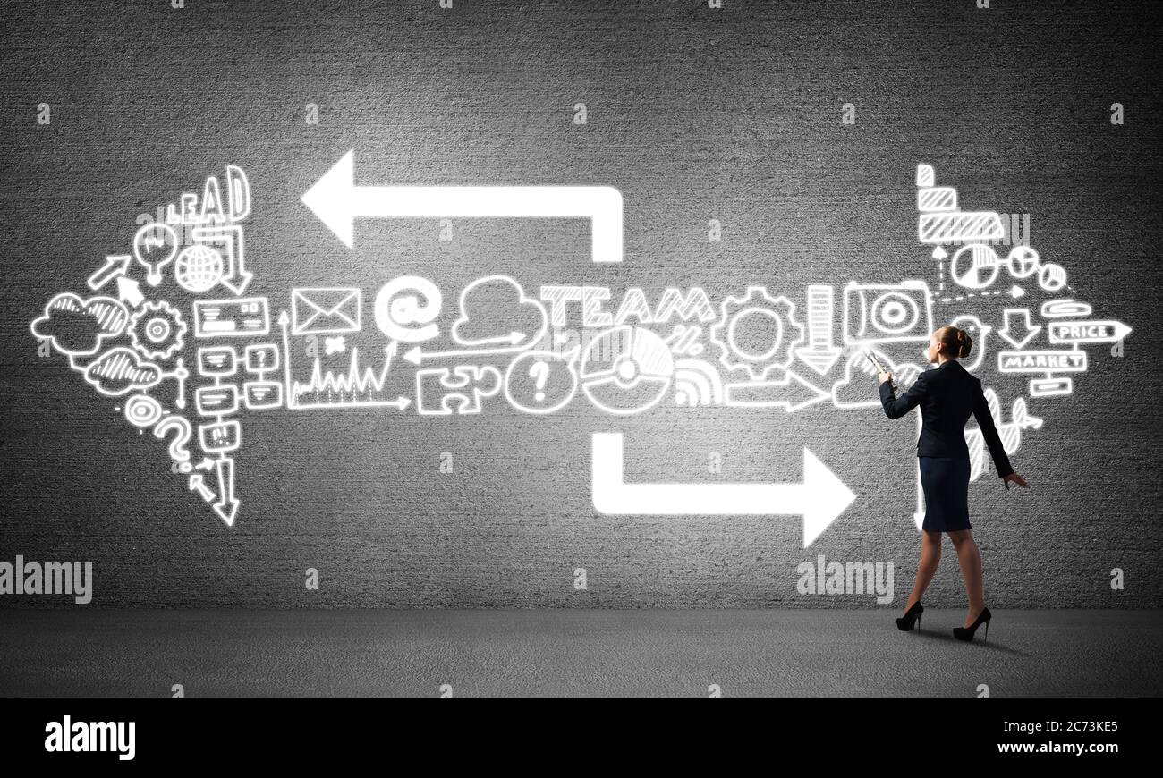 Woman throwing light on her ideas Stock Photo - Alamy