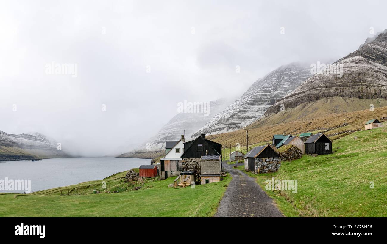 Dramatic landscape on Faroe Islands with traditional houses in the ...