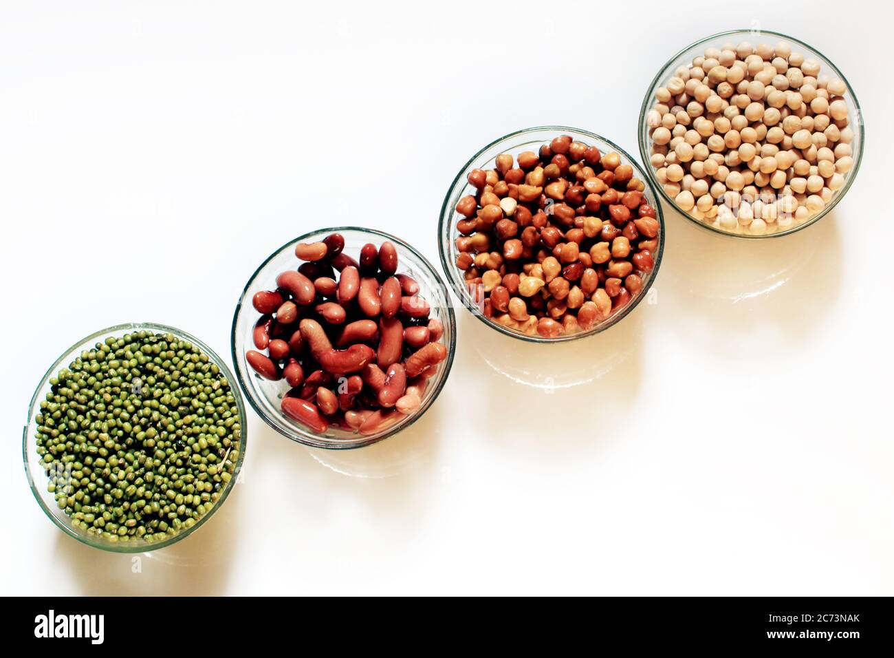 Collection of legumes (chickpeas, green peas, Pink lentils, Indian ...