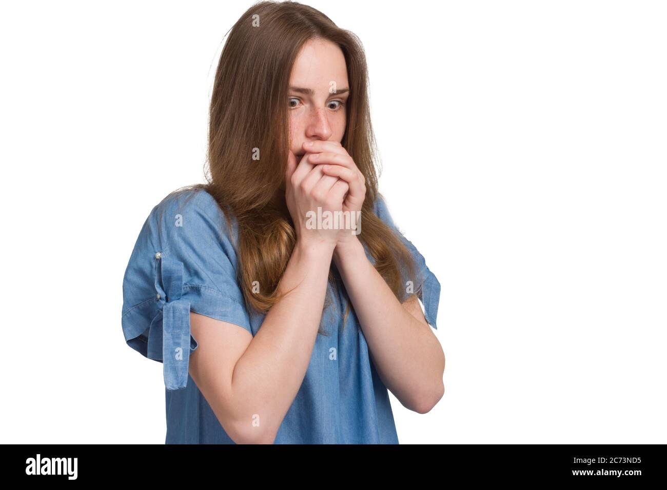 Woman hands on face scared hi-res stock photography and images - Alamy