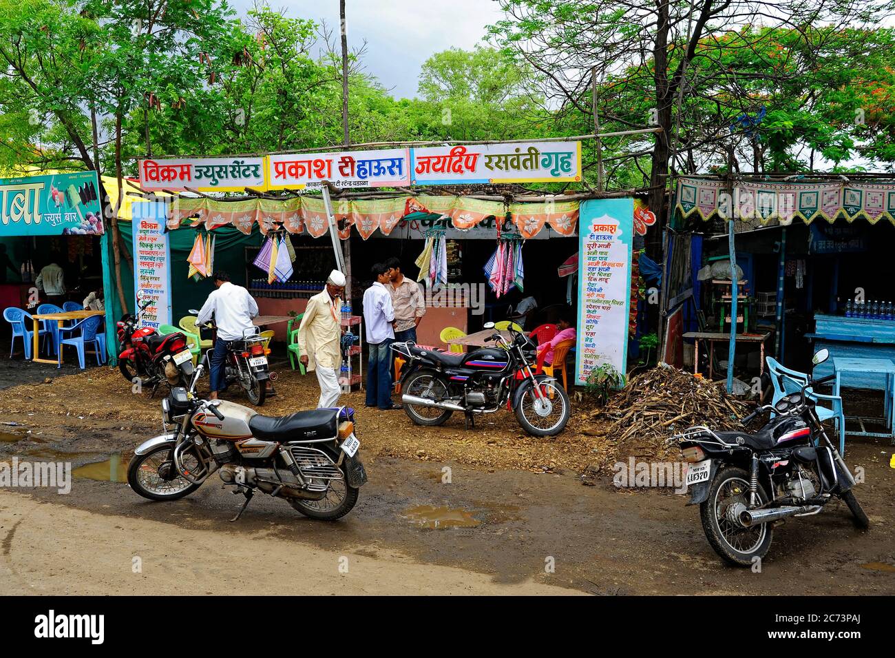 Colour full shops and hotels on road at Solapur city state Maharashtra ...