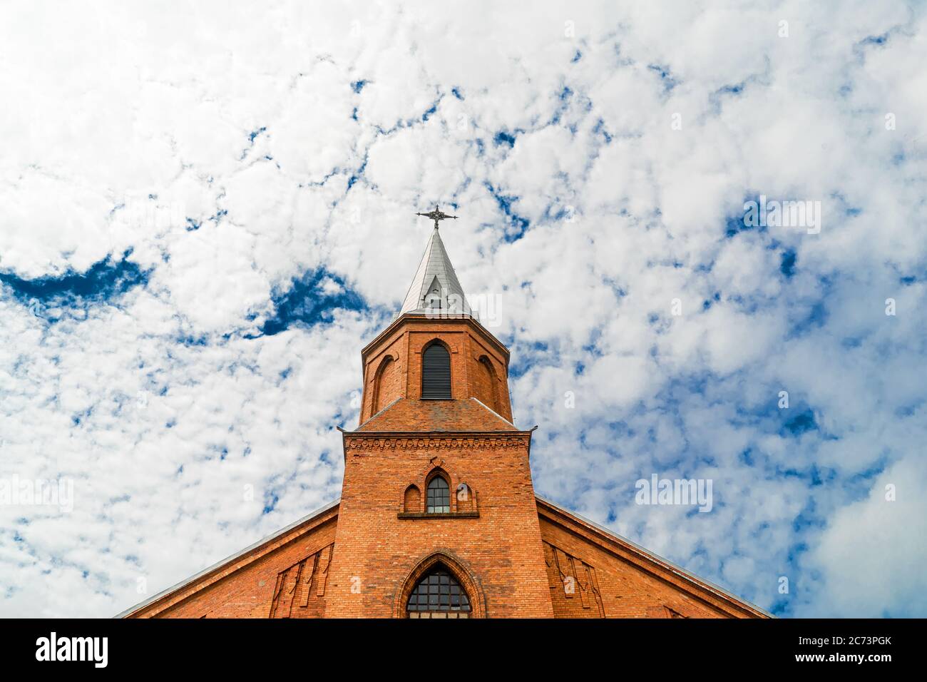 Old Church on the background of blue sky and white clouds Stock Photo ...