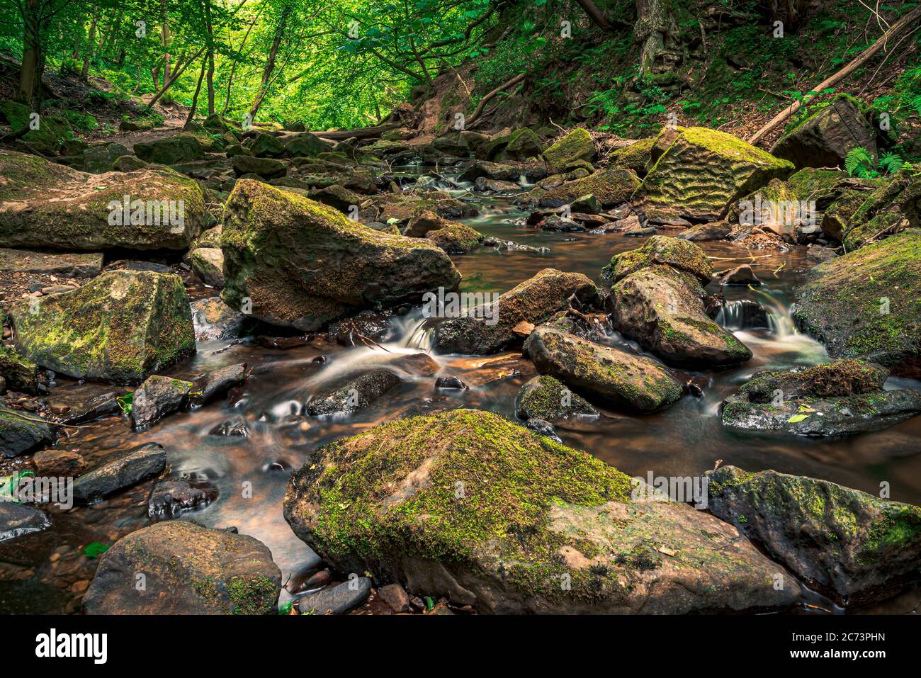 Falling Foss waterfall, rocks, flowing river & May Beck stream Stock ...