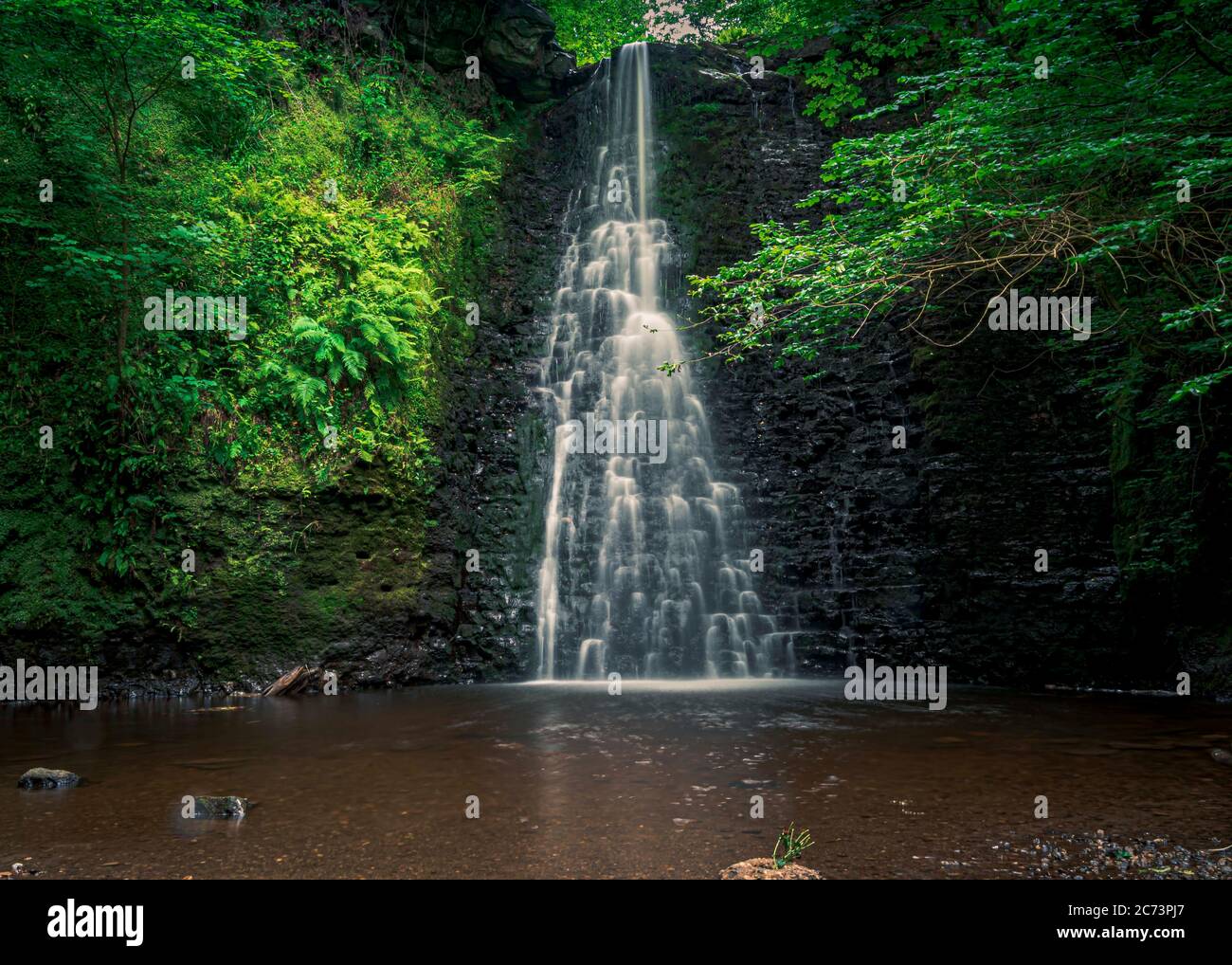 Falling Foss waterfall, rocks, flowing river & May Beck stream Stock ...