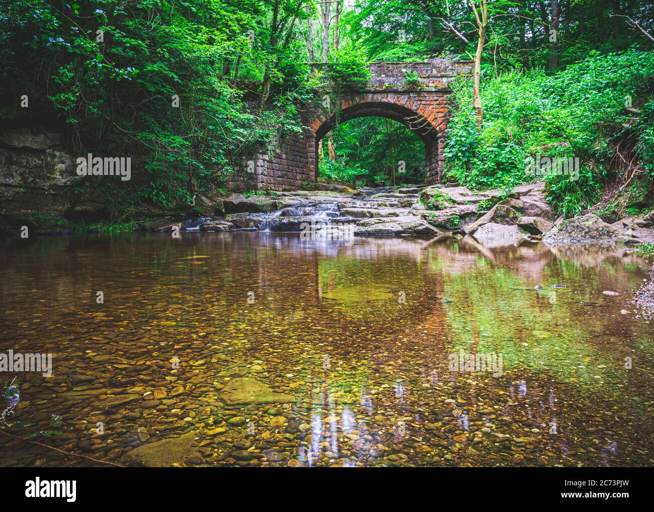 Falling Foss waterfall, rocks, flowing river & May Beck stream Stock ...