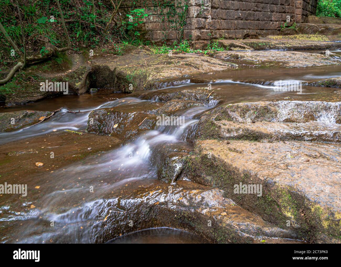 Falling Foss waterfall, rocks, flowing river & May Beck stream Stock ...