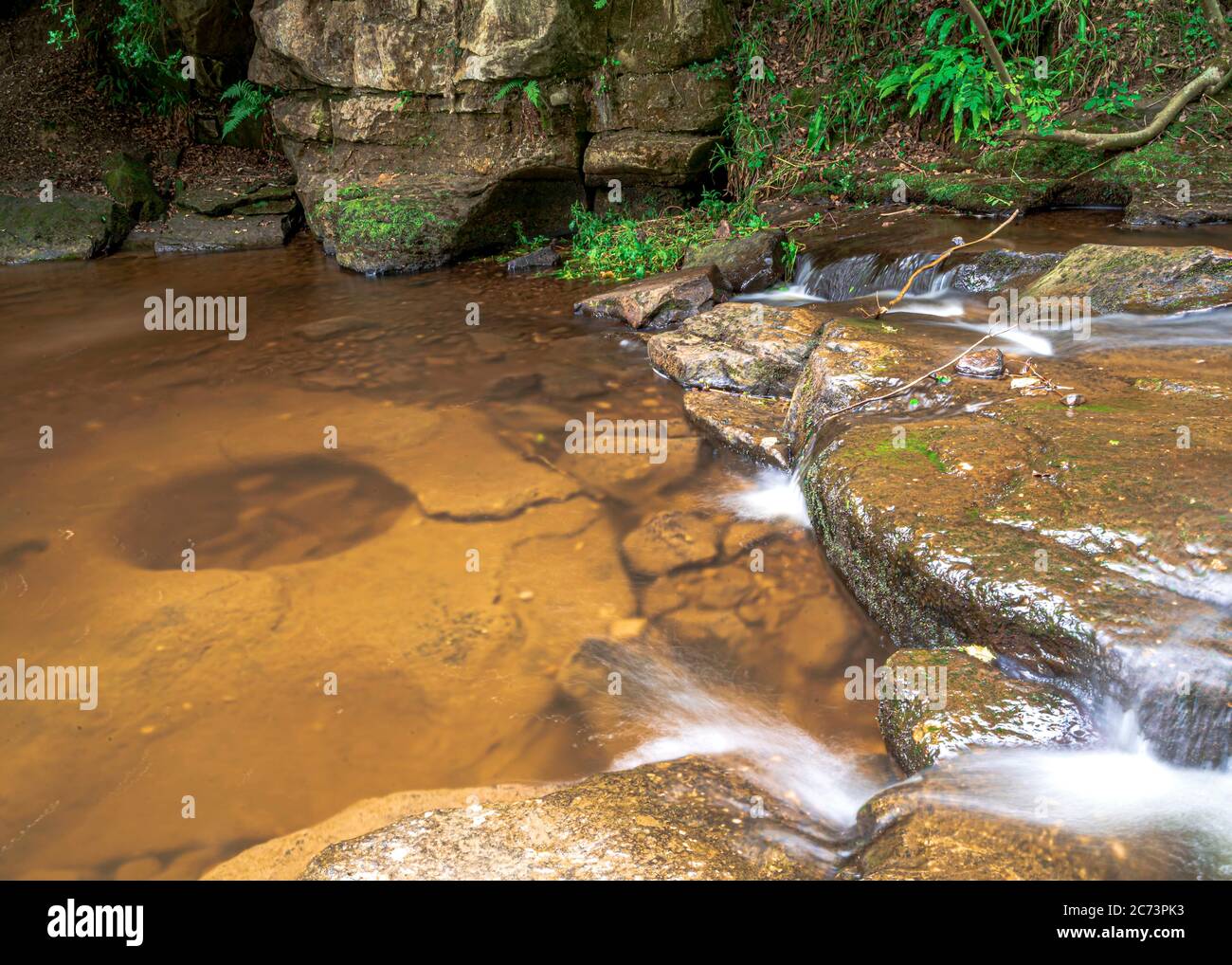 Falling Foss waterfall, rocks, flowing river & May Beck stream Stock ...