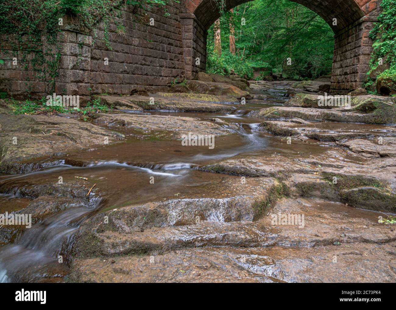 Falling Foss waterfall, rocks, flowing river & May Beck stream Stock ...