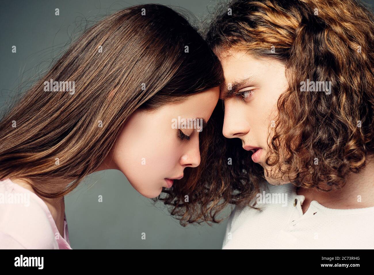 Couple looking at each other - close up sensual portrait. Man vs woman ...
