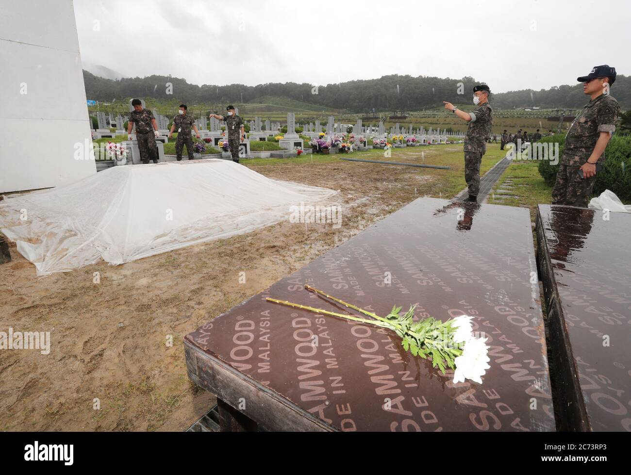 14th July, 2020. Prep for burial of Korean War hero Soldiers prepare ...