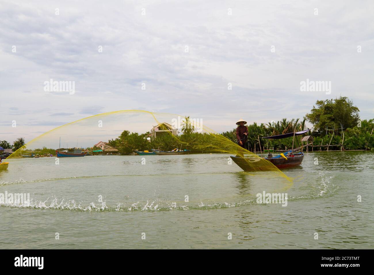 Fishing net on wooden boat in the river, Bay Mau coconut forest ...