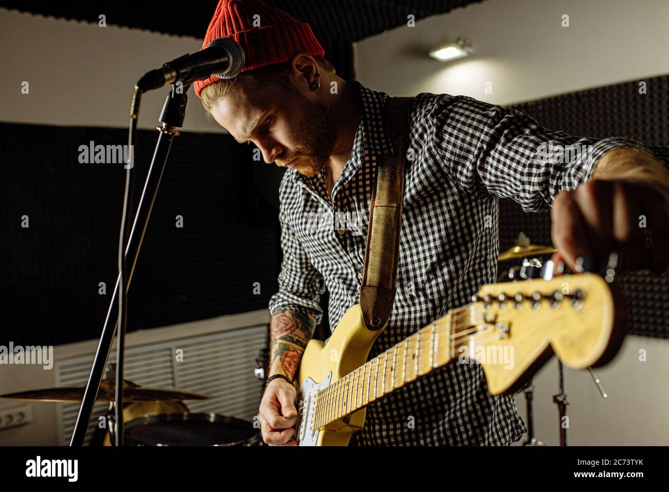 close-up photo of electric guitar, talented musician hold guitar in ...
