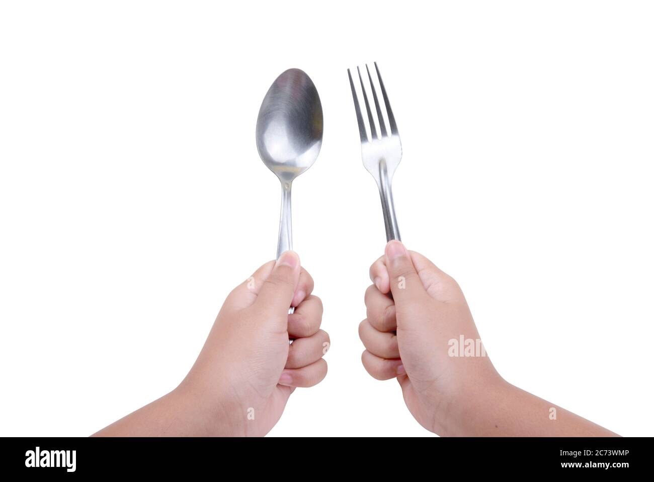 Hands holding spoon and fork isolated over white background Stock Photo ...