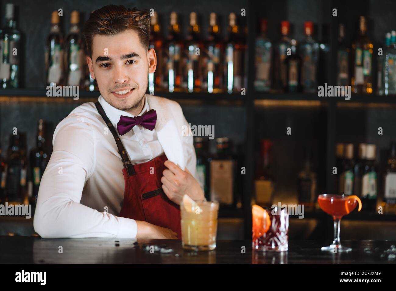 Professional barman in white shirt hi-res stock photography and images ...
