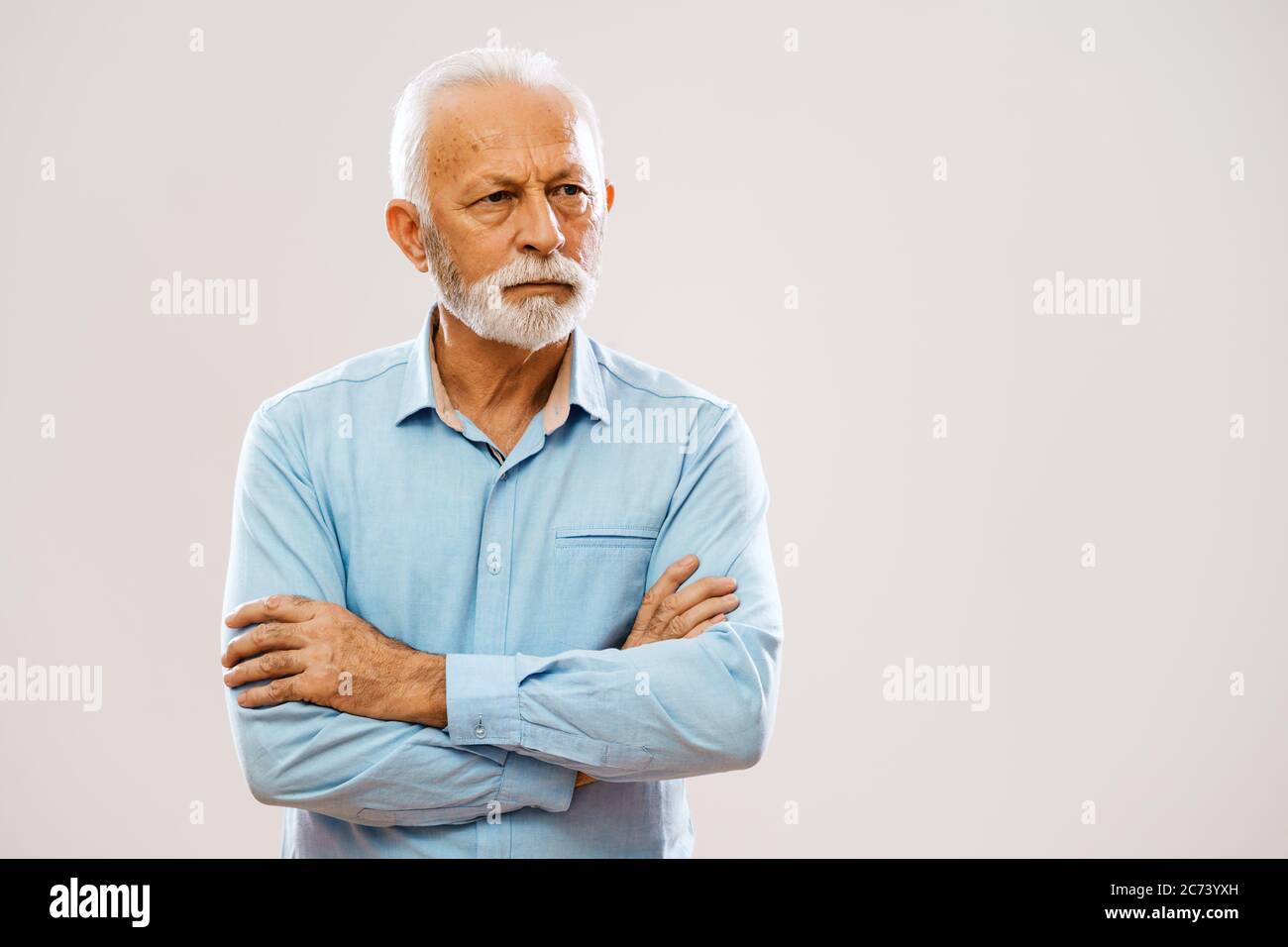 Portrait of pensive and angry senior man Stock Photo - Alamy
