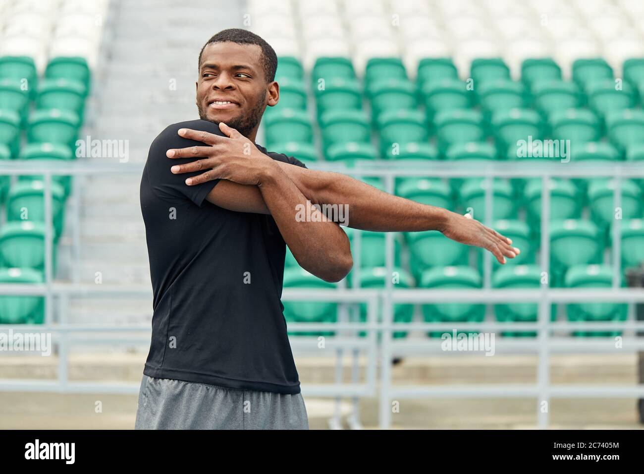 Muscular man outstretched arms hi-res stock photography and images - Alamy