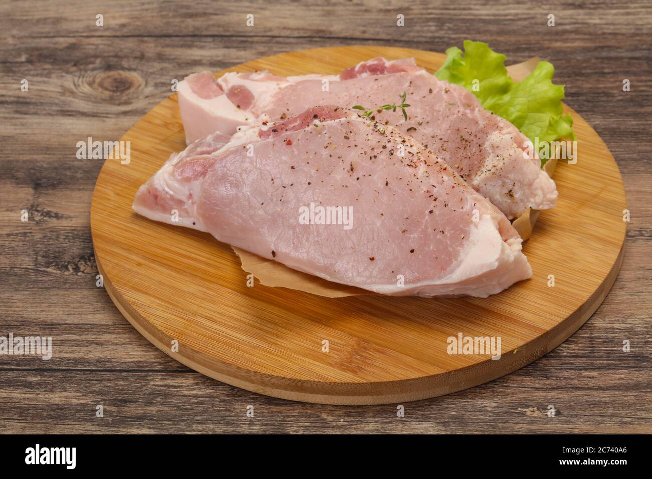 Raw pork meat steak ready for grill Stock Photo - Alamy