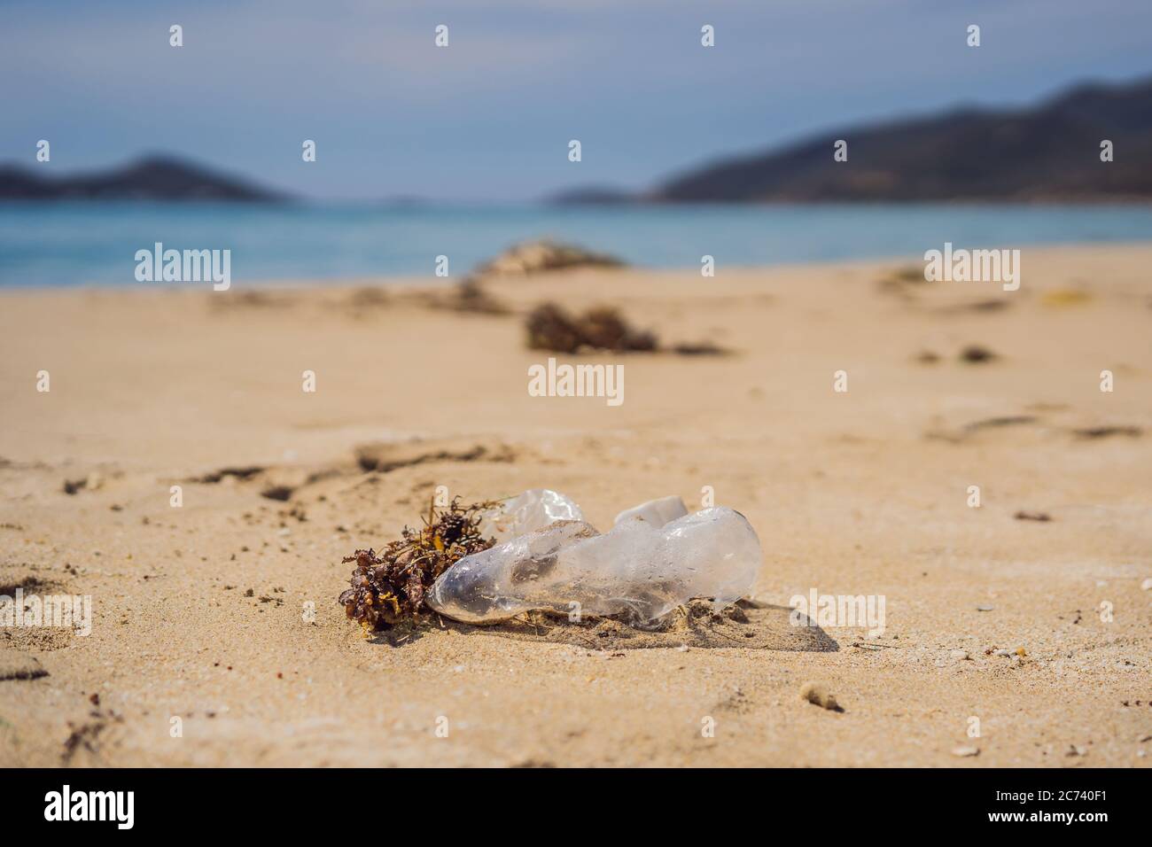 Garbage on a beach, environmental pollution concept Stock Photo - Alamy
