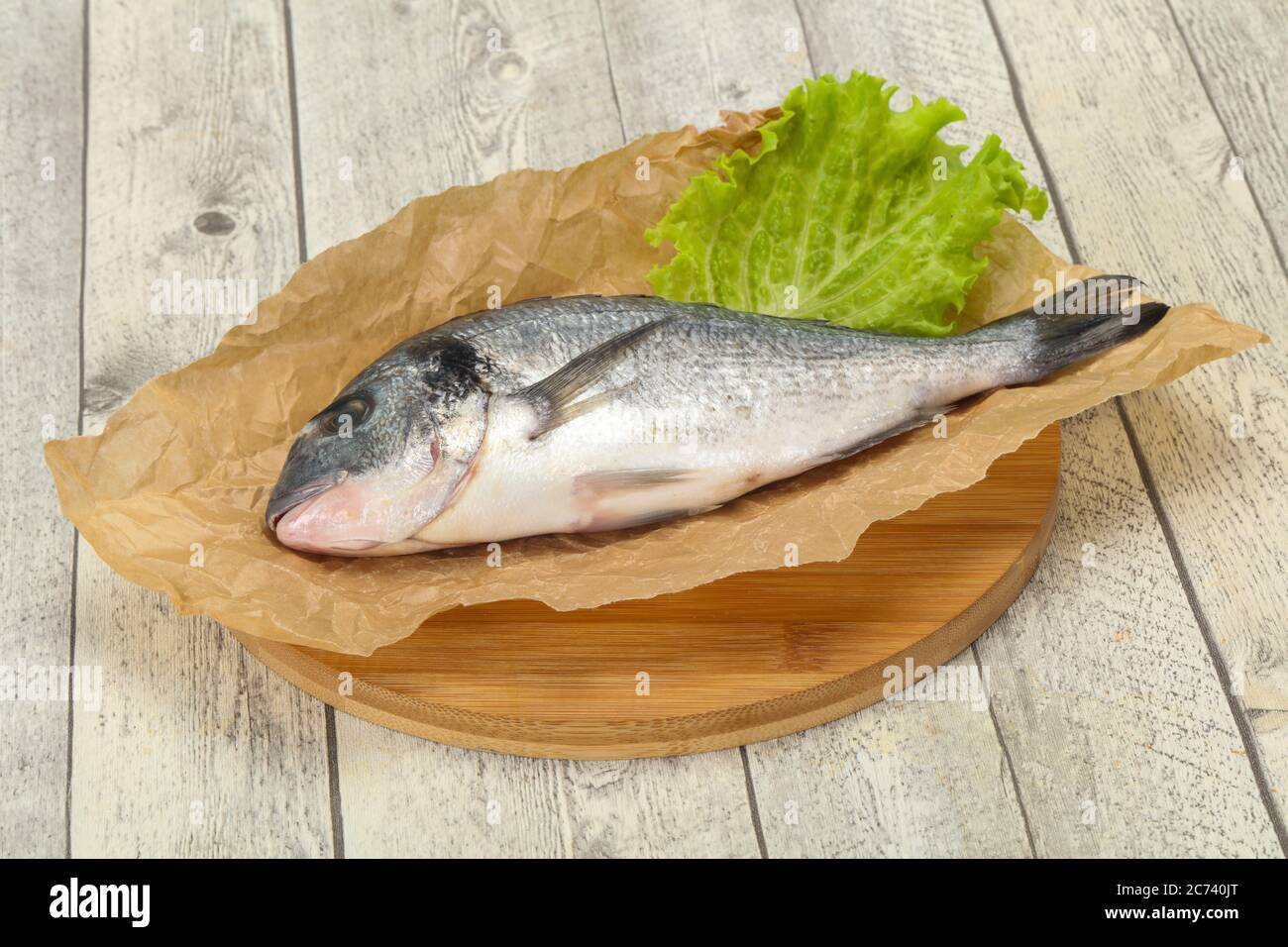 Raw Dorada fish ready for cooking Stock Photo - Alamy