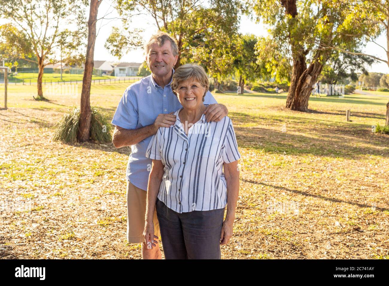 Portrait of caucasian senior couple in their 70s embracing showing love ...
