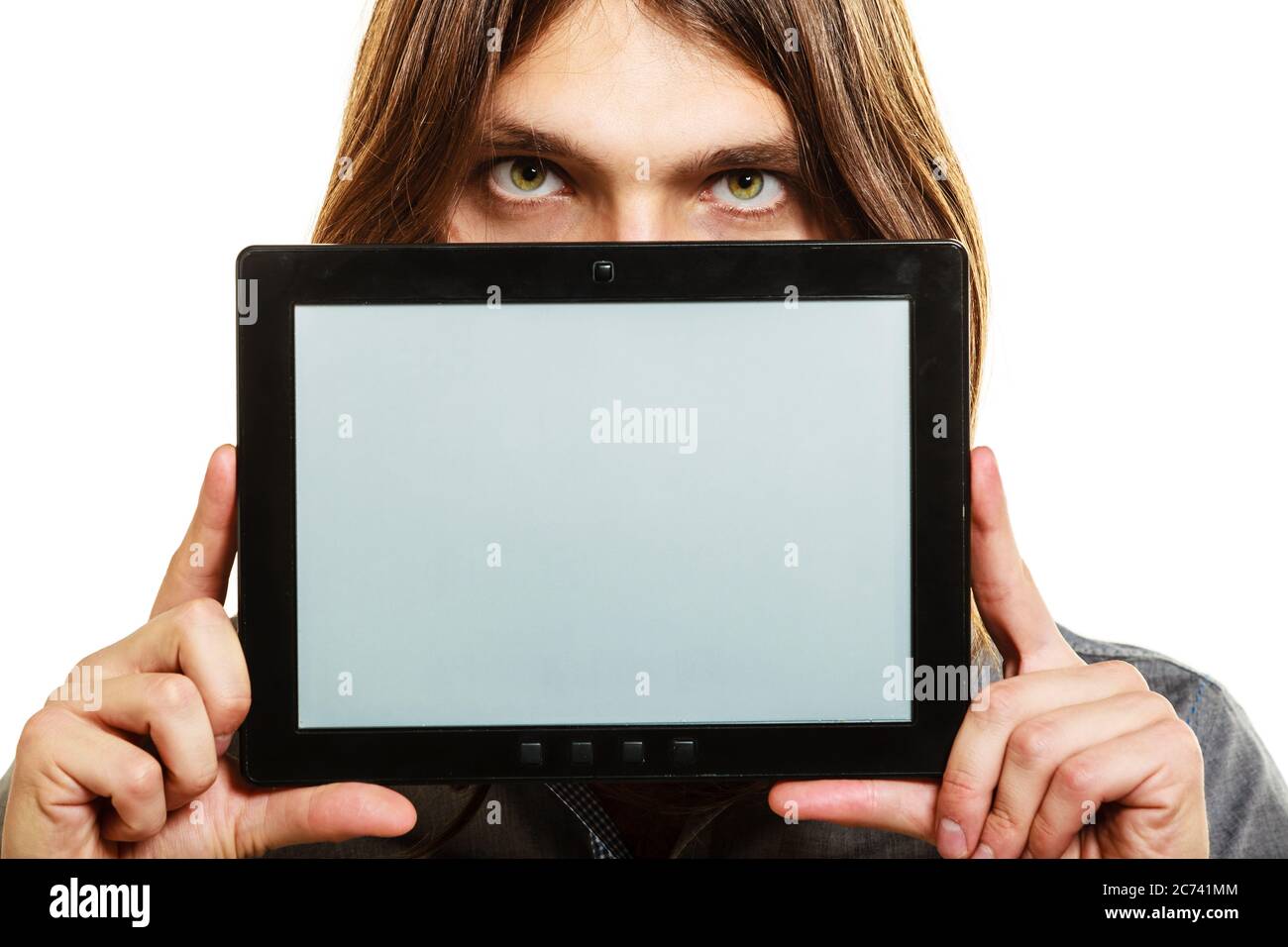 Elegant handsome man holding tablet computer with blank screen showing ...