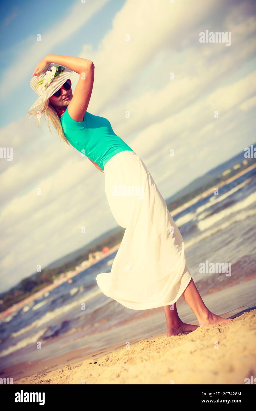 Summer time relax leisure concept. Attractive woman on the beach. Lady ...