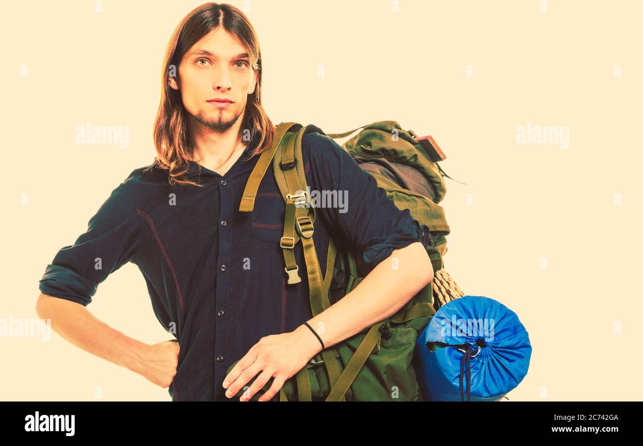 Portrait of man tourist backpacker on trip. Young guy hiker backpacking ...