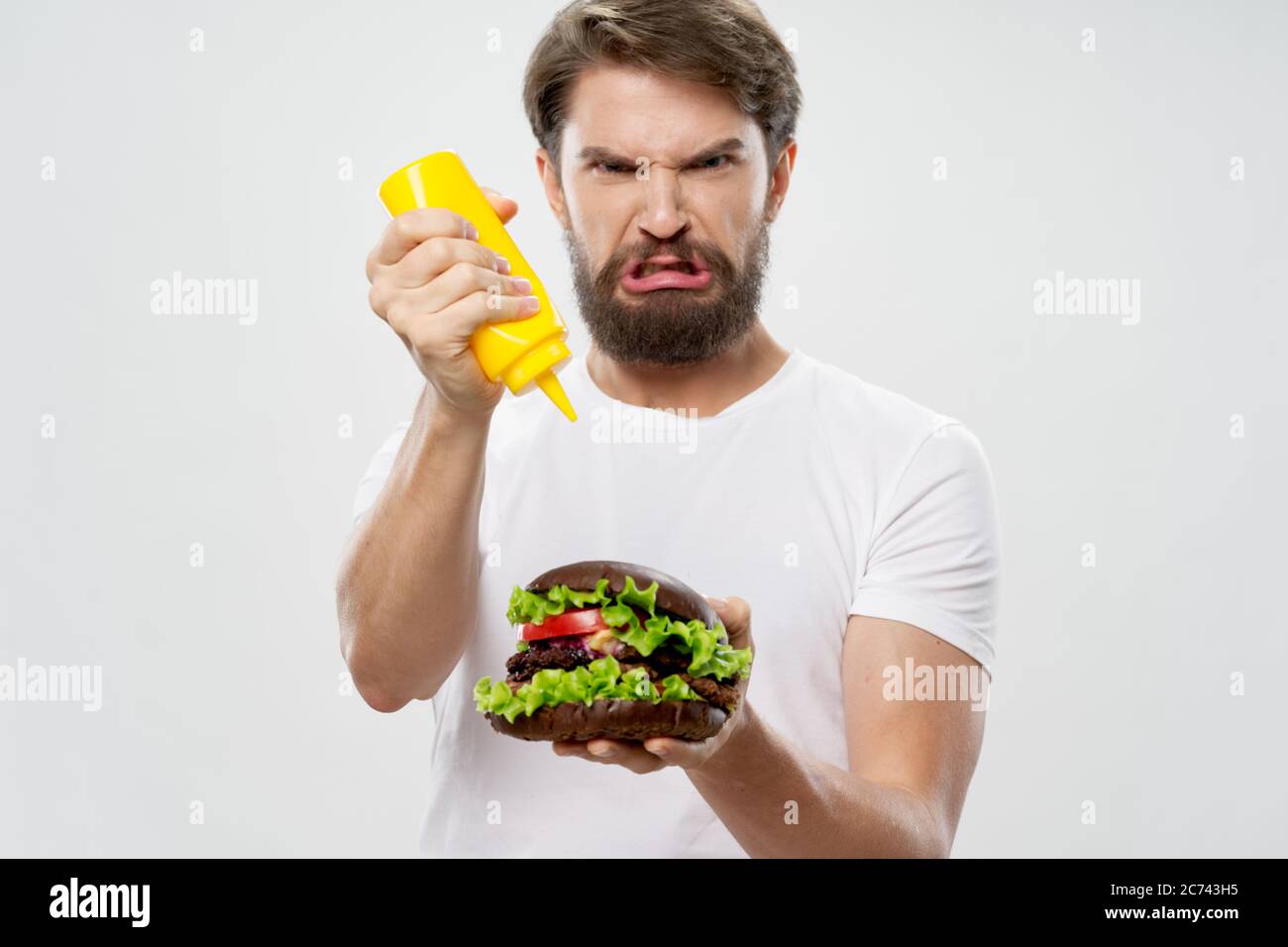 Disgust eating in restaurant hi-res stock photography and images - Alamy