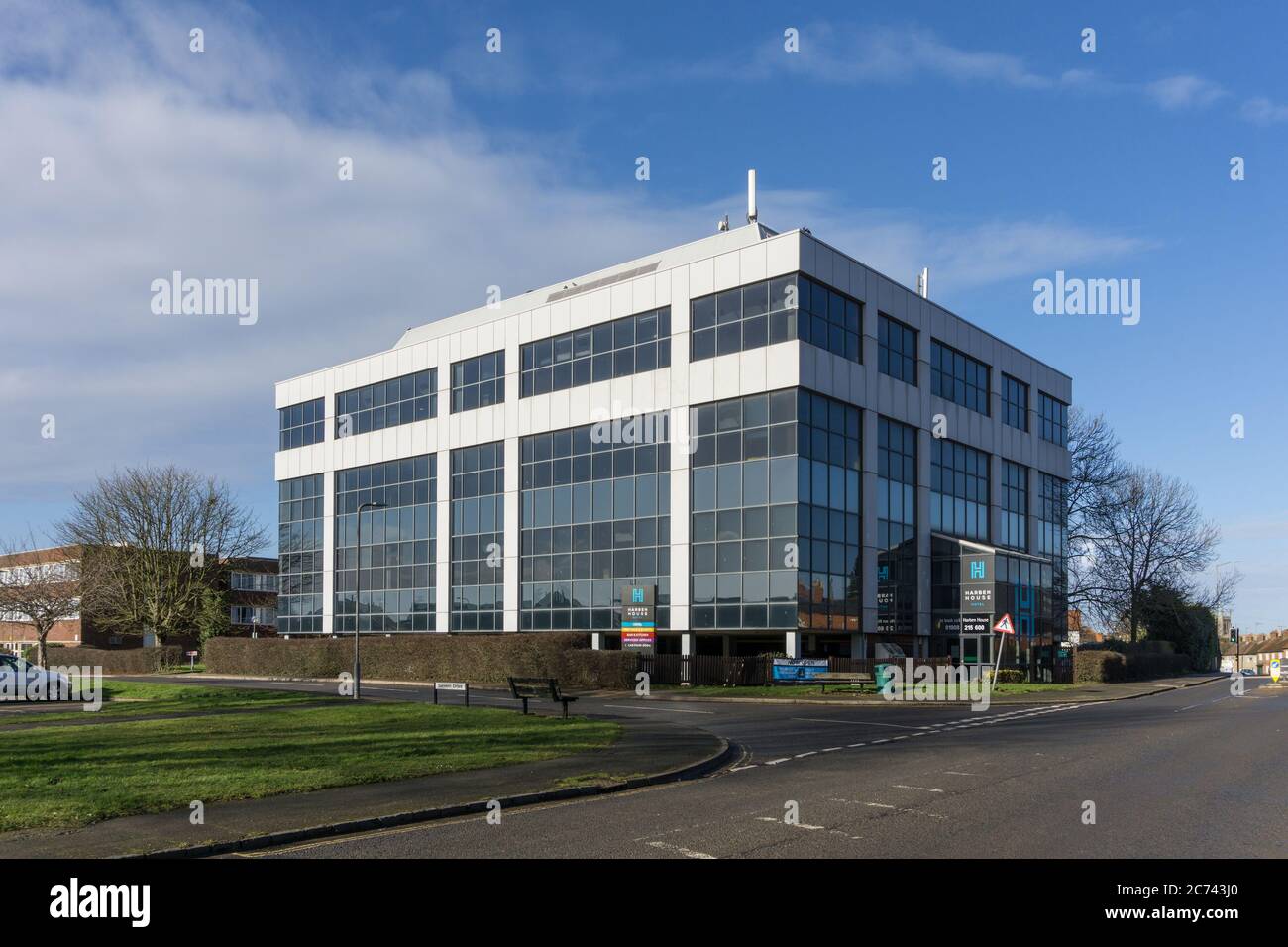 Harben House Hotel, a modern glass fronted building in Newport Pagnell ...