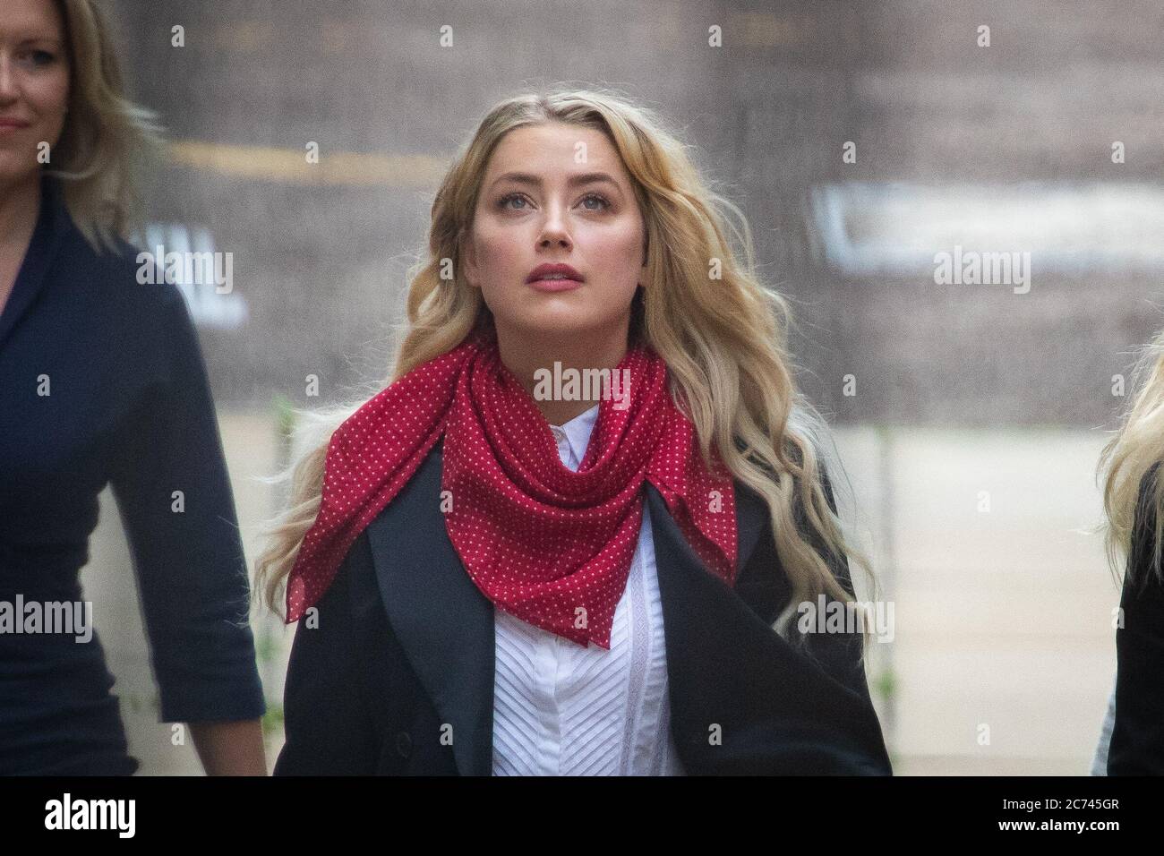 Actress Amber Heard arrives at the High Court in London for a hearing ...