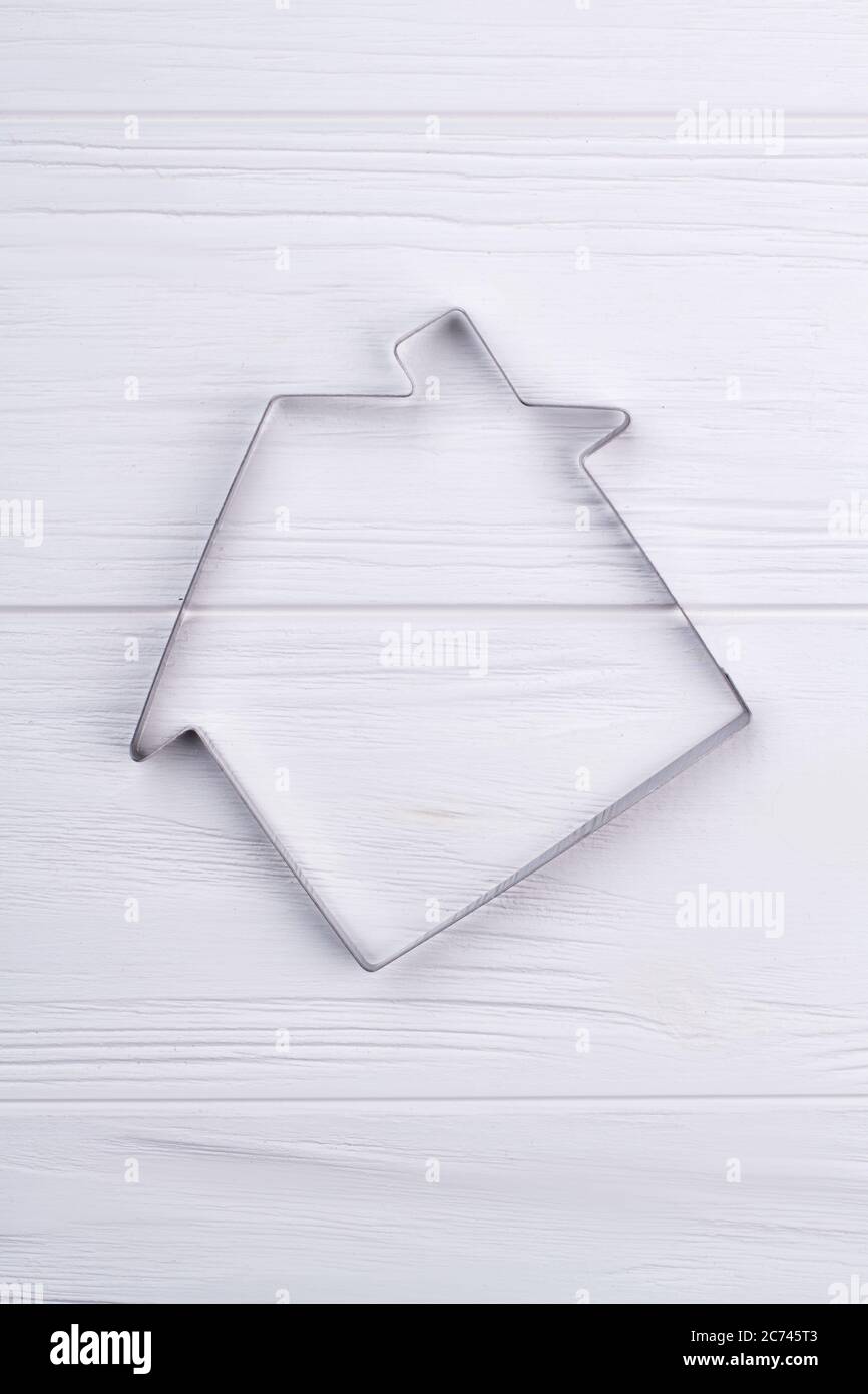 Metal frame in shape of house Stock Photo - Alamy