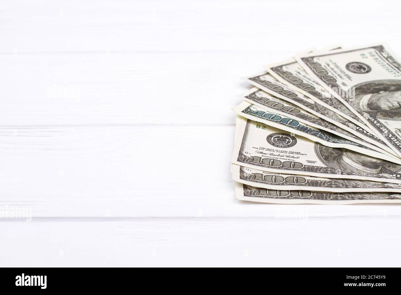 US dollar banknotes on white background Stock Photo - Alamy