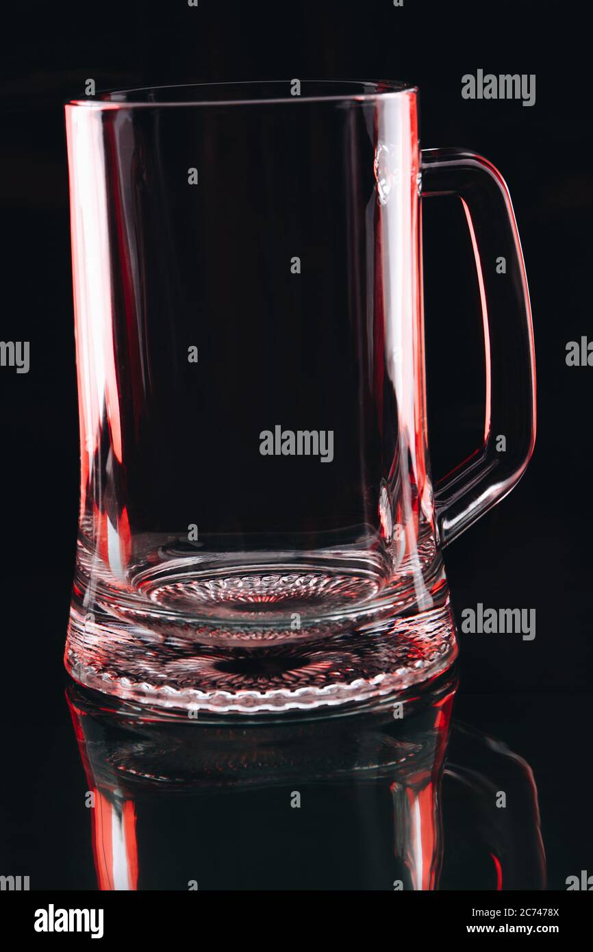 Empty beer mug on dark background Stock Photo - Alamy