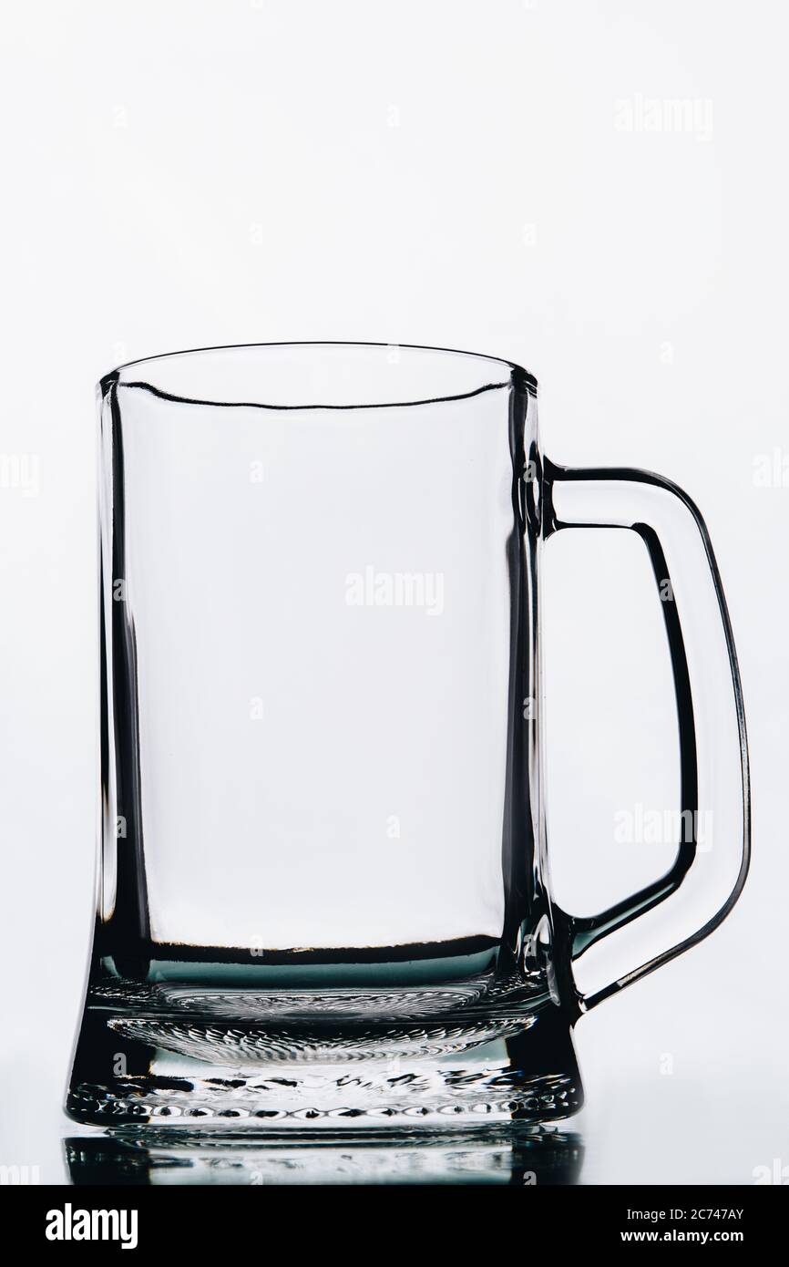 Empty beer mug on white background Stock Photo - Alamy