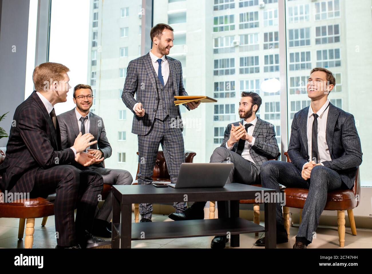 Men here are team leaders hi-res stock photography and images - Alamy