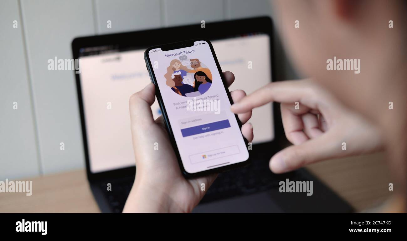CHIANG MAI, THAILAND - JUN 22, 2020 : female touching iPhone with ...