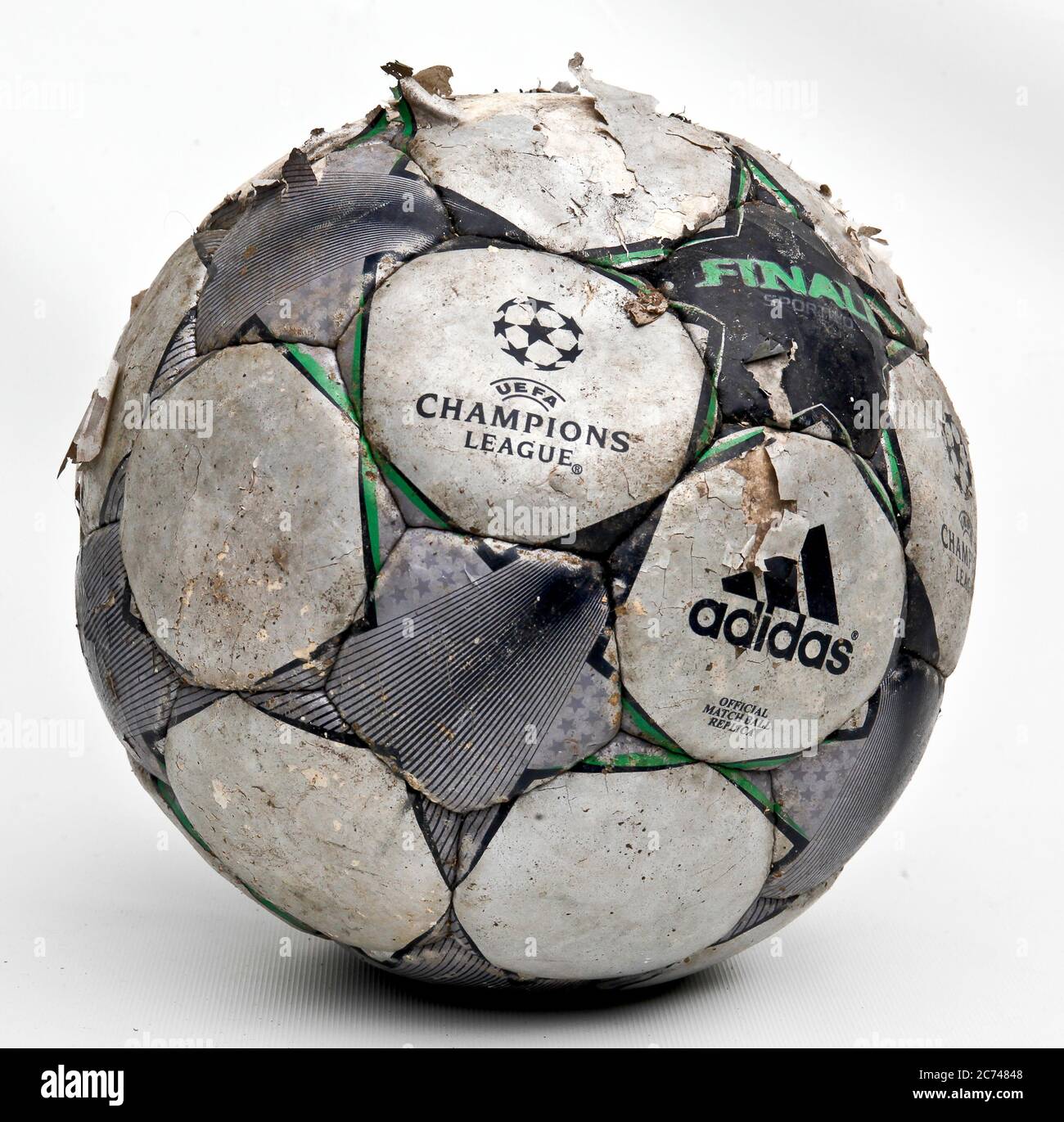 Damaged soccer ball Stock Photo - Alamy